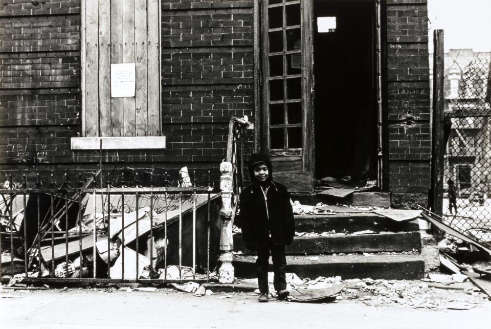 Untitled (Boy in front of condemned building, East New York ...